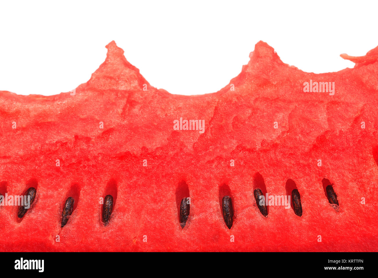 Sliced of watermelon with a bite taken out, isolated on white ...