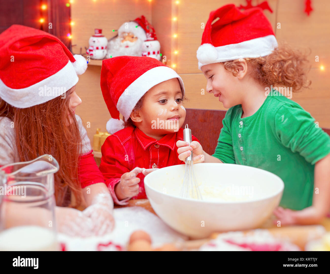 Kids playing game dinner table hi-res stock photography and images - Alamy
