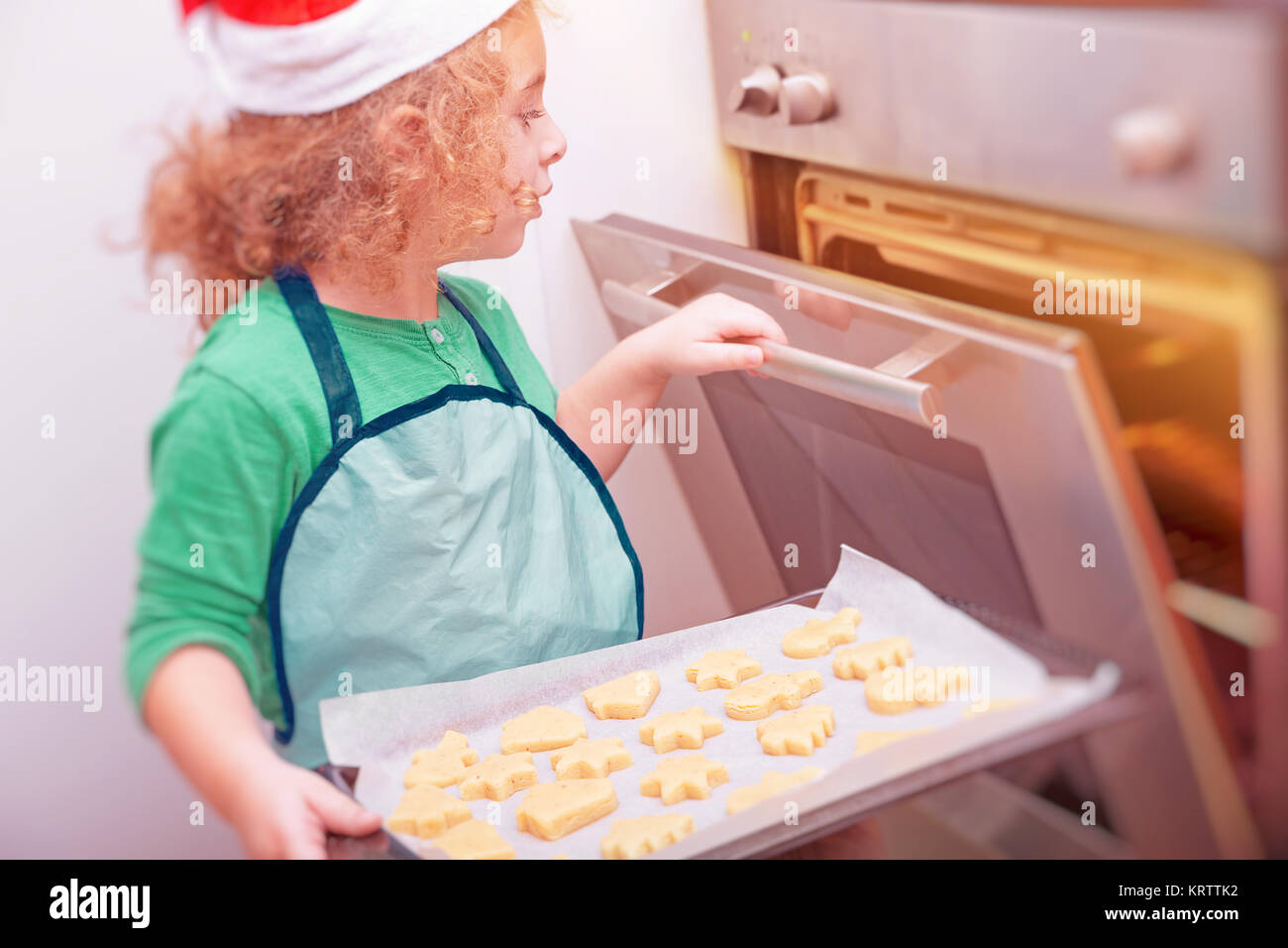 Little boy making Christmas cookies Stock Photo - Alamy