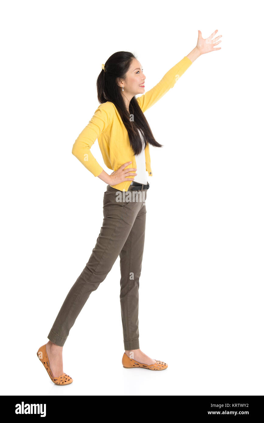 Woman grabbing something Stock Photo - Alamy