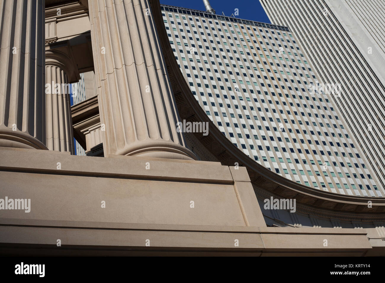 Close-up view of Millennium Monument with skyscrapers in background ...