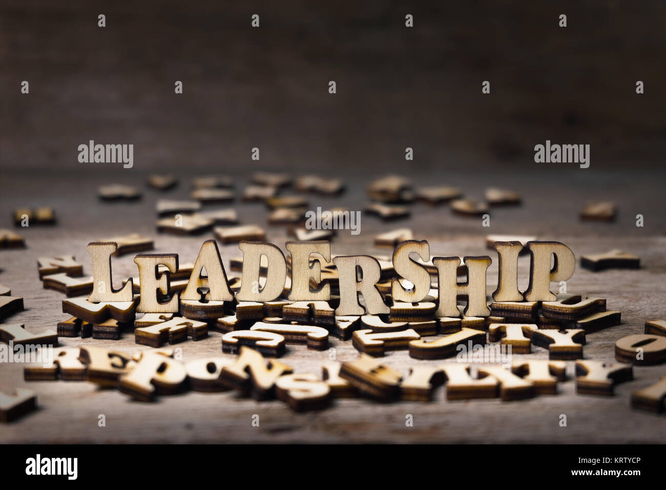 Wood Alphabets form a Word Placed on Scattered Alphabets for Leadership ...