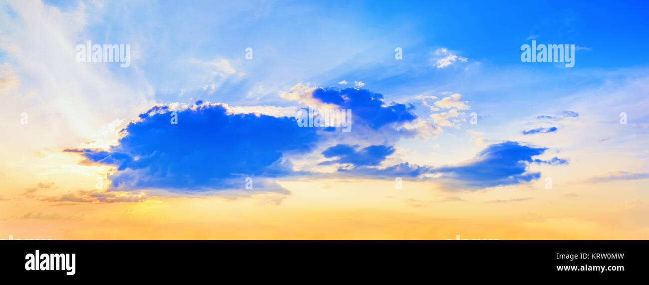 Sunset with cumulus clouds Stock Photo - Alamy