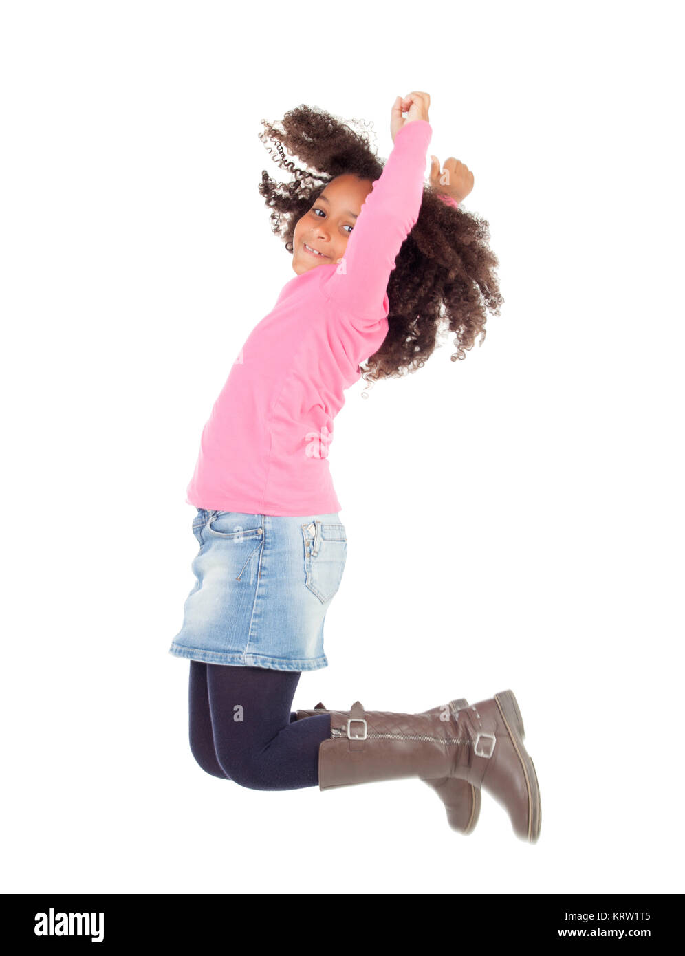 Adorable african little girl jumping Stock Photo - Alamy