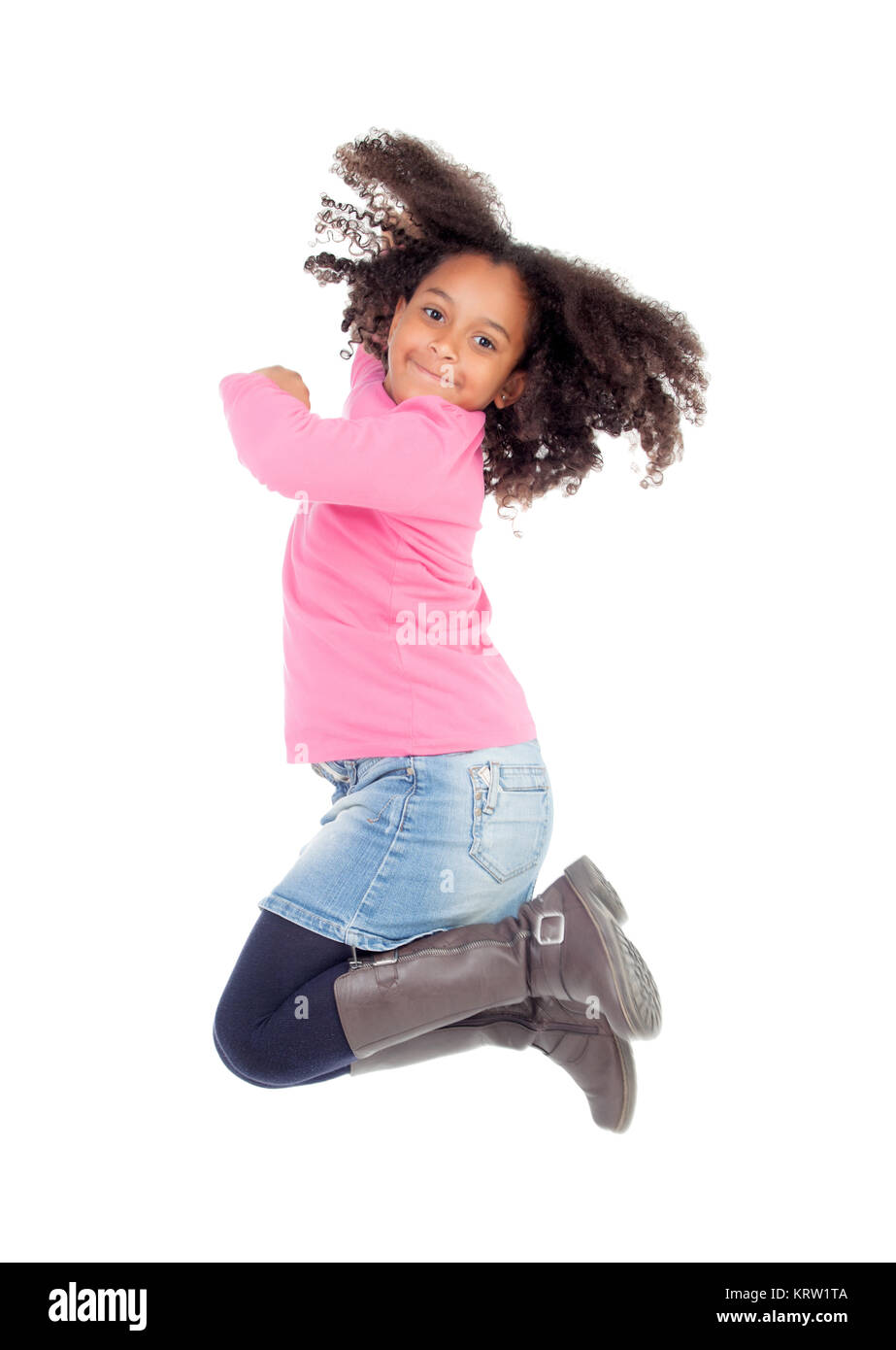 Adorable african little girl jumping Stock Photo - Alamy
