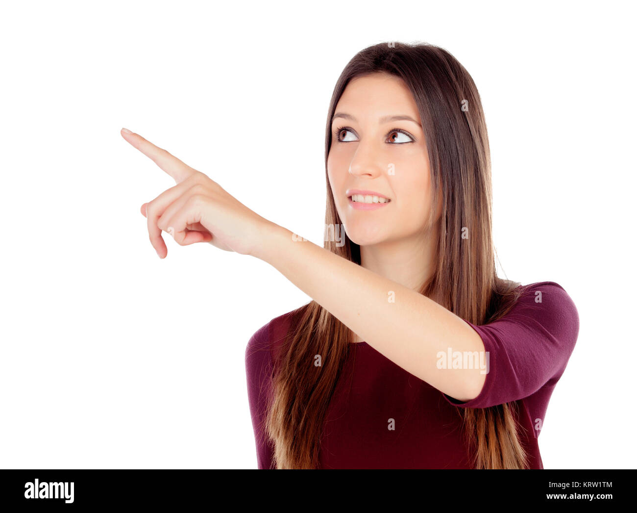 Attractive young girl indicating something Stock Photo - Alamy