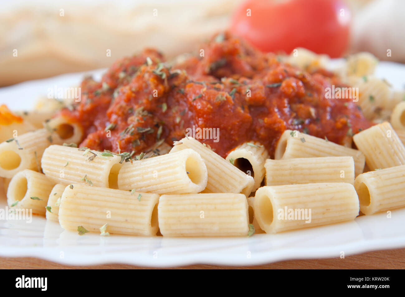 Delicious plate of macaroni with tomato Stock Photo - Alamy