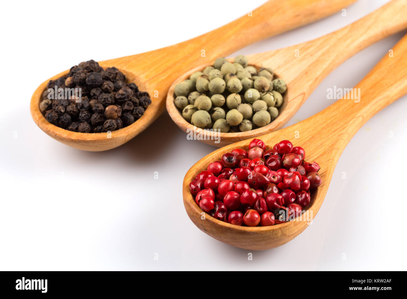 spoons with pepper Stock Photo - Alamy