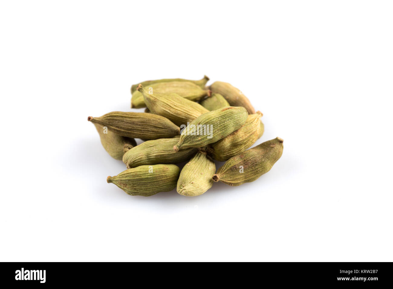 cardamom pods isolated on white Stock Photo - Alamy