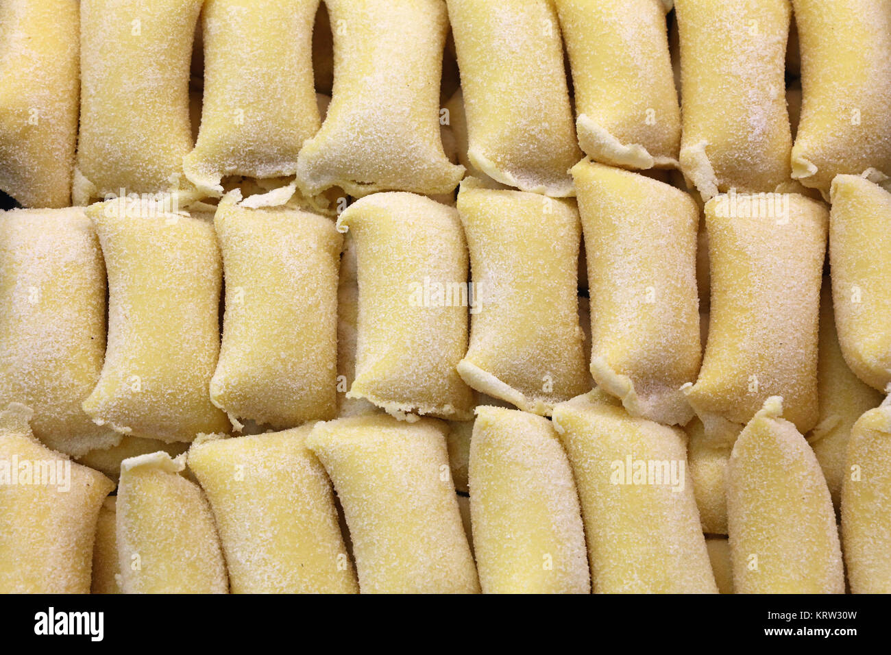 Fresh Italian stuffed ravioli pasta in retail Stock Photo - Alamy