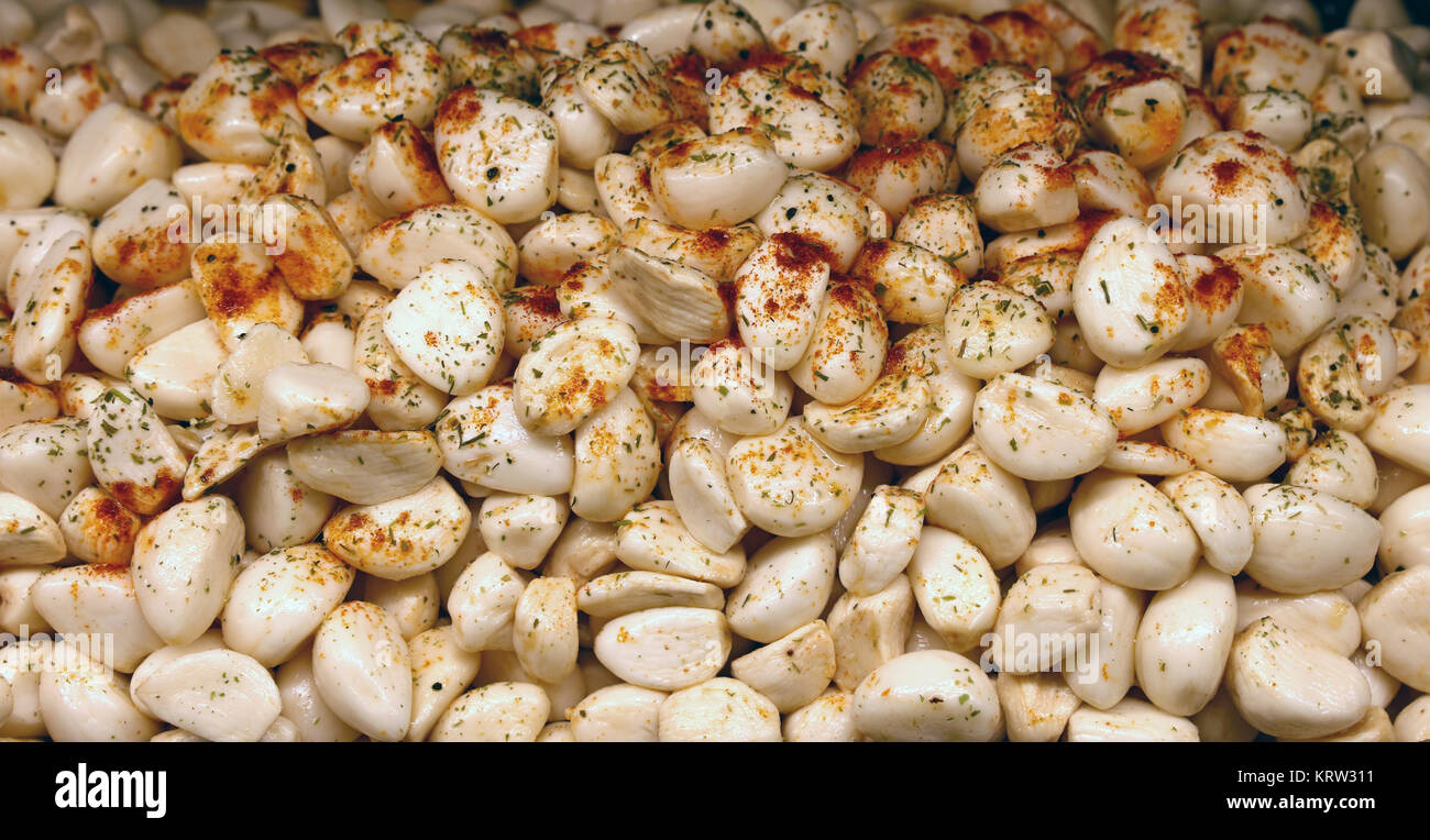 Pickled marinated garlic chives with spices Stock Photo - Alamy
