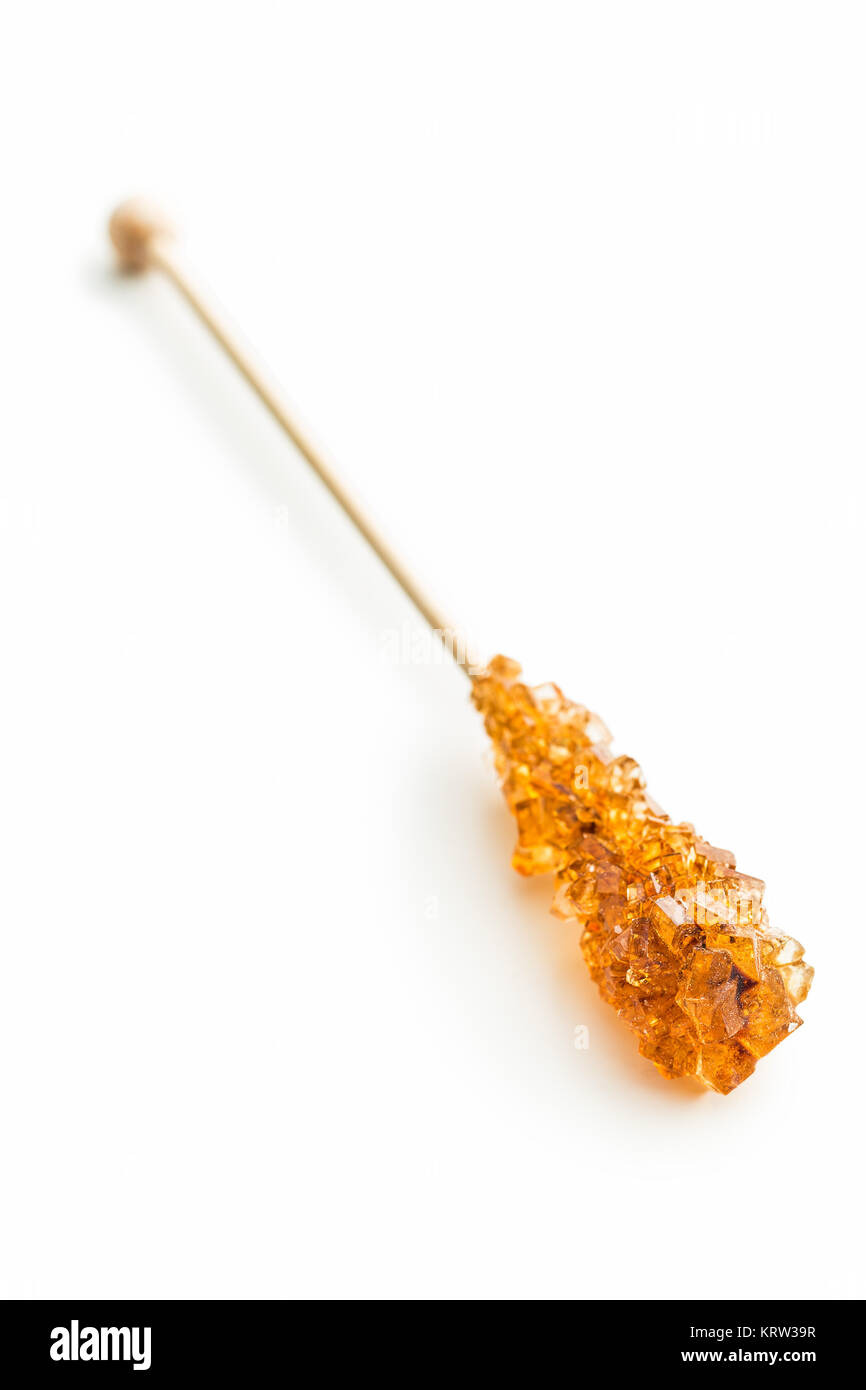 Brown amber sugar crystal on wooden stick Stock Photo - Alamy
