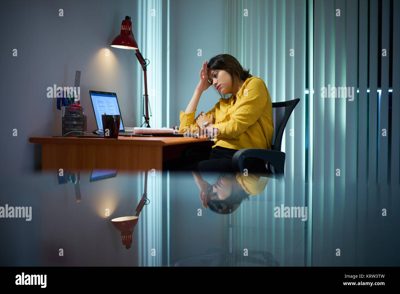 Female student studying night tired hi-res stock photography and images ...