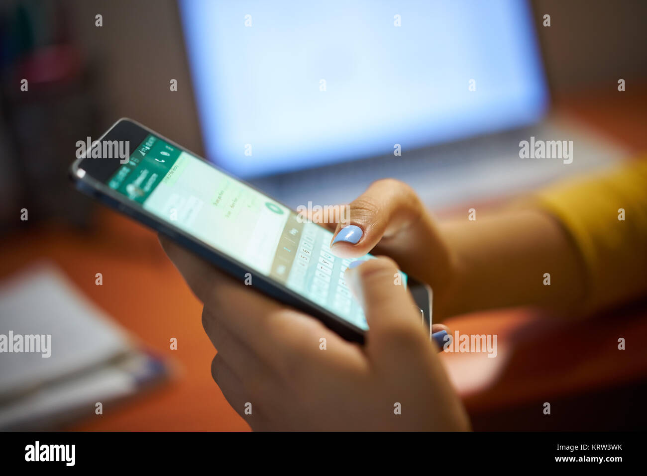 Girl Typing Phone Message On Social Network At Night Stock Photo - Alamy