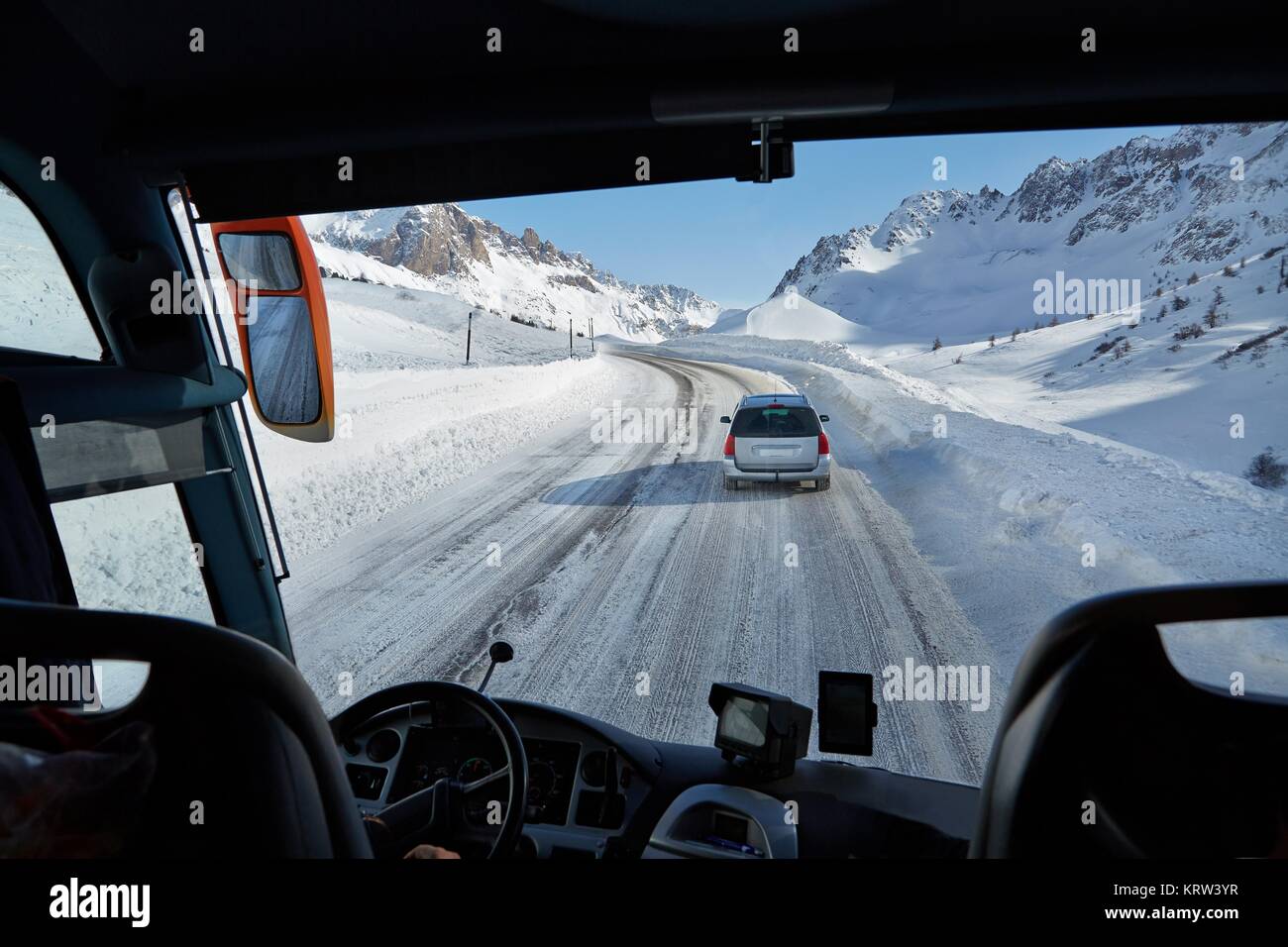 Driving bus in snow storm Stock Photo - Alamy