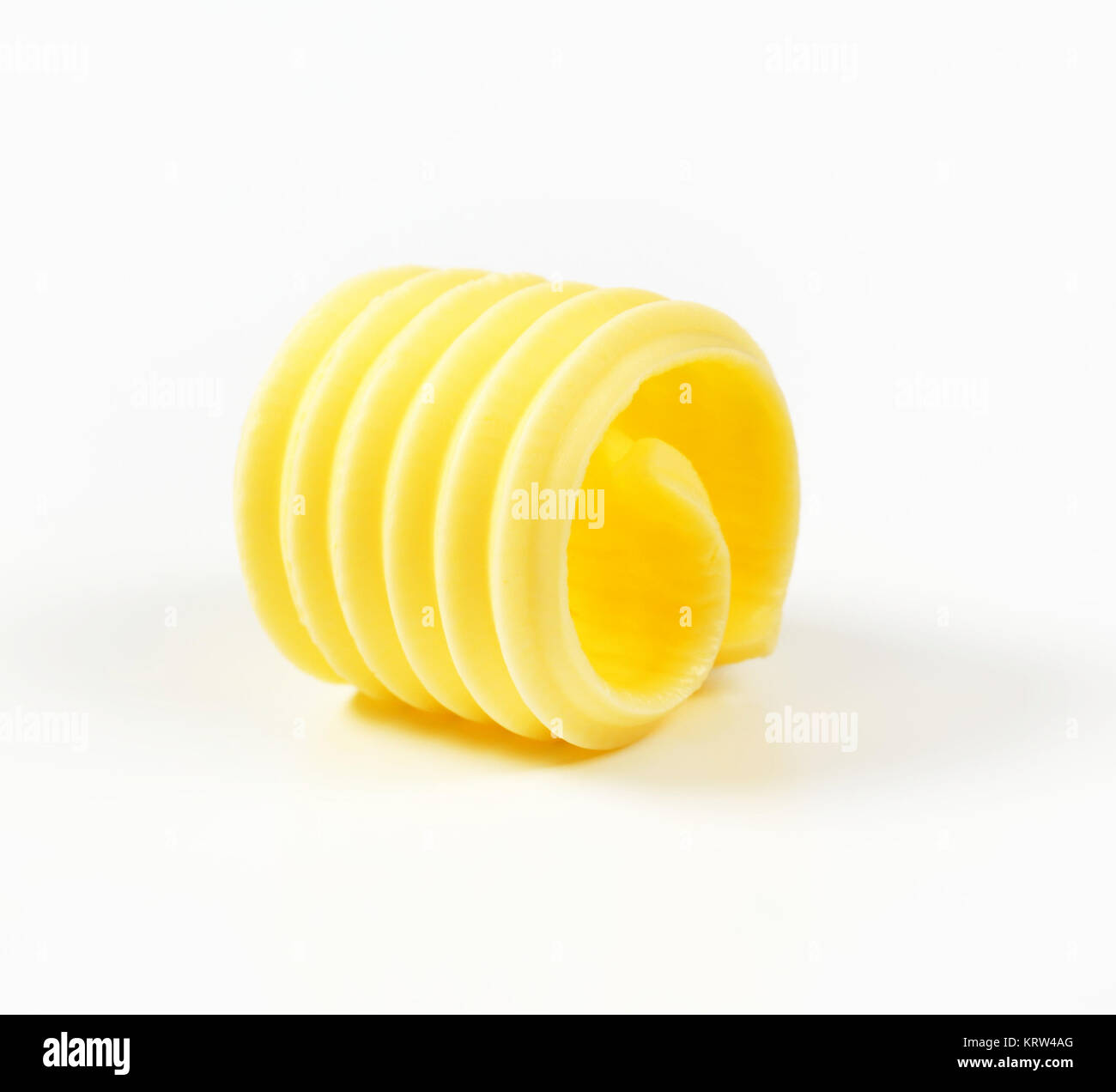 Single butter curl Stock Photo - Alamy
