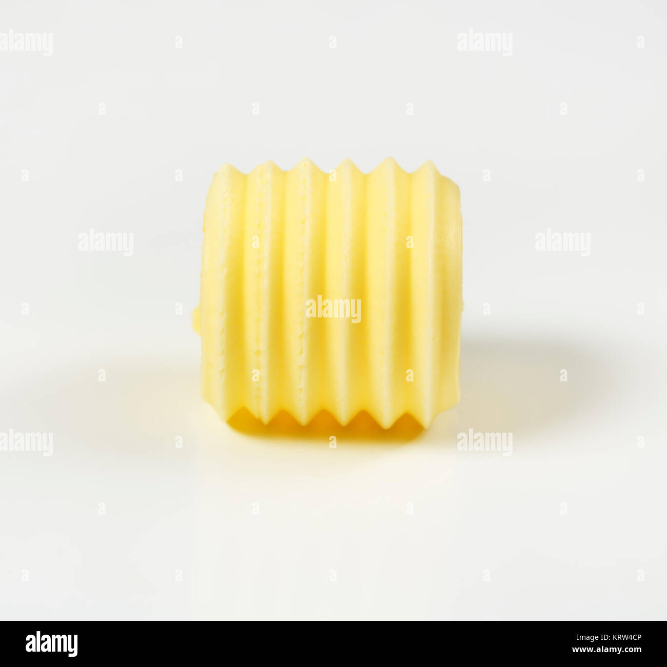 Single butter curl Stock Photo - Alamy