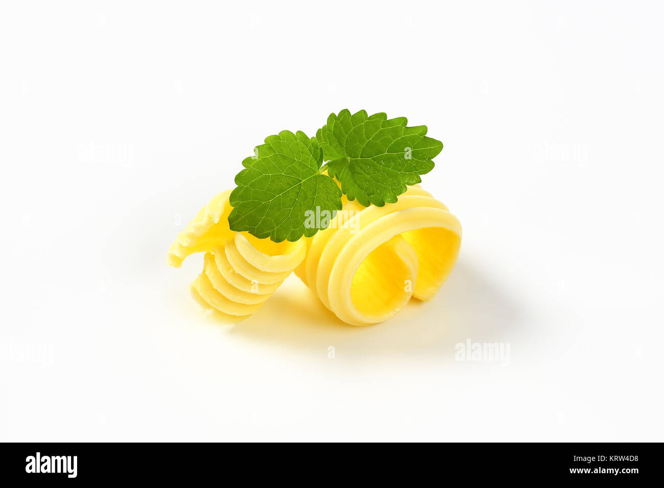 Two butter curls Stock Photo - Alamy