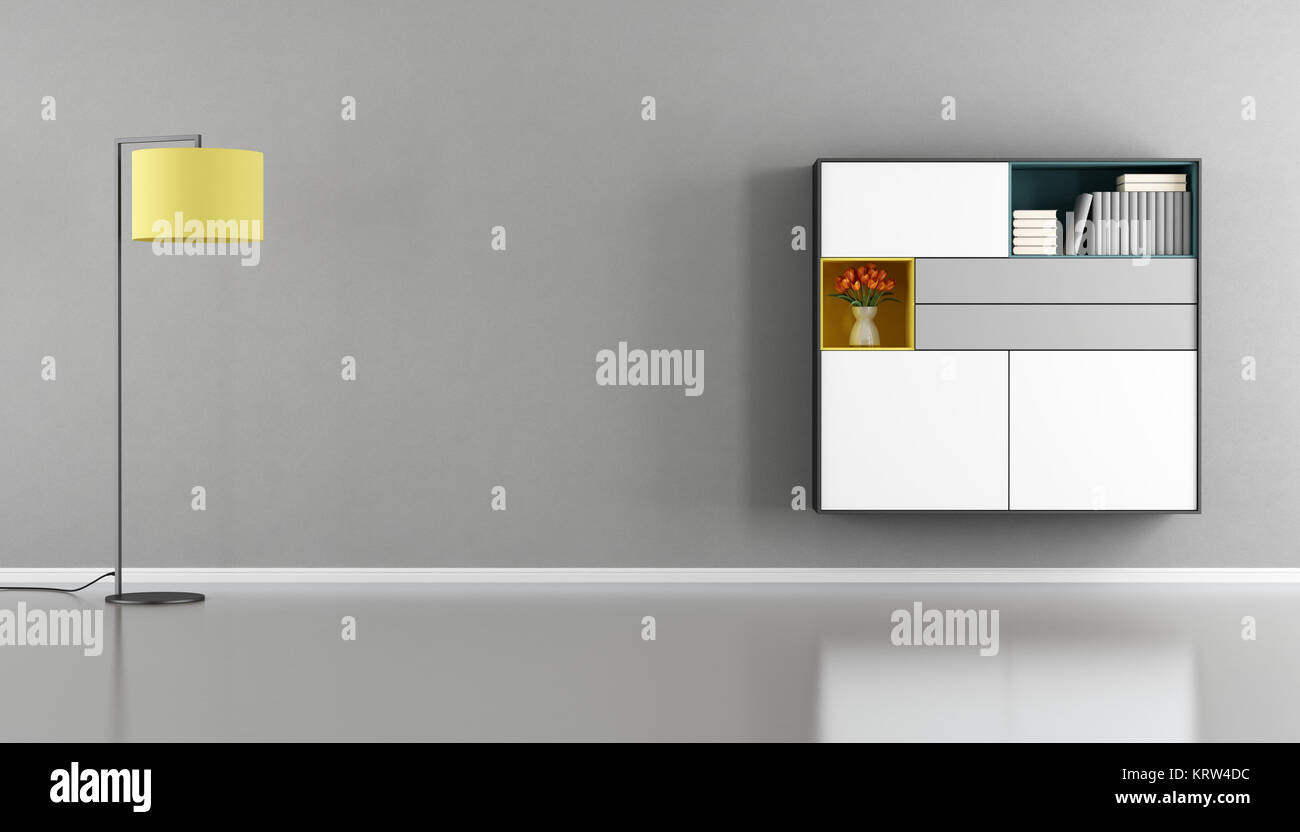 Modern living room with sideboard on wall Stock Photo - Alamy