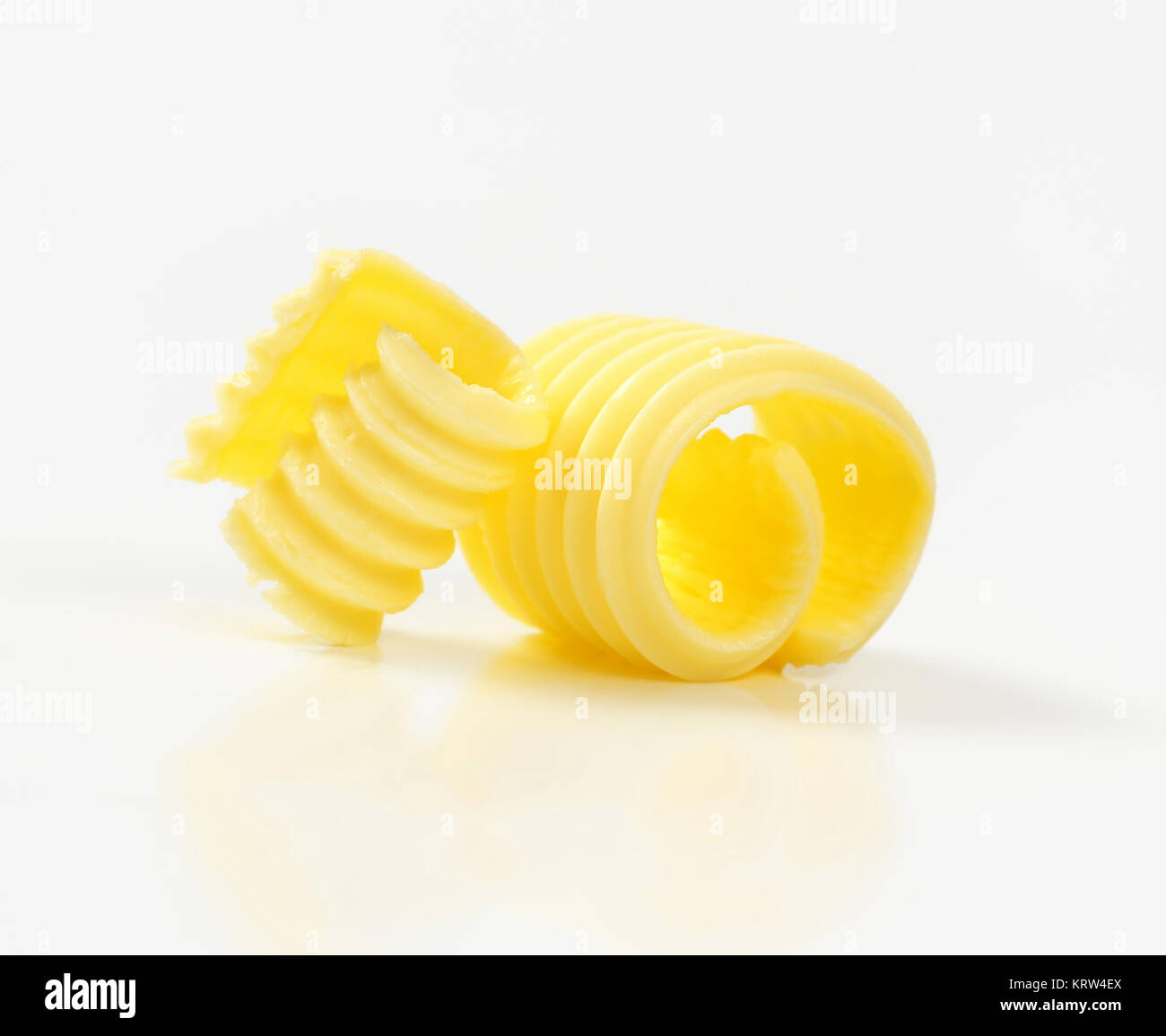Two butter curls Stock Photo - Alamy