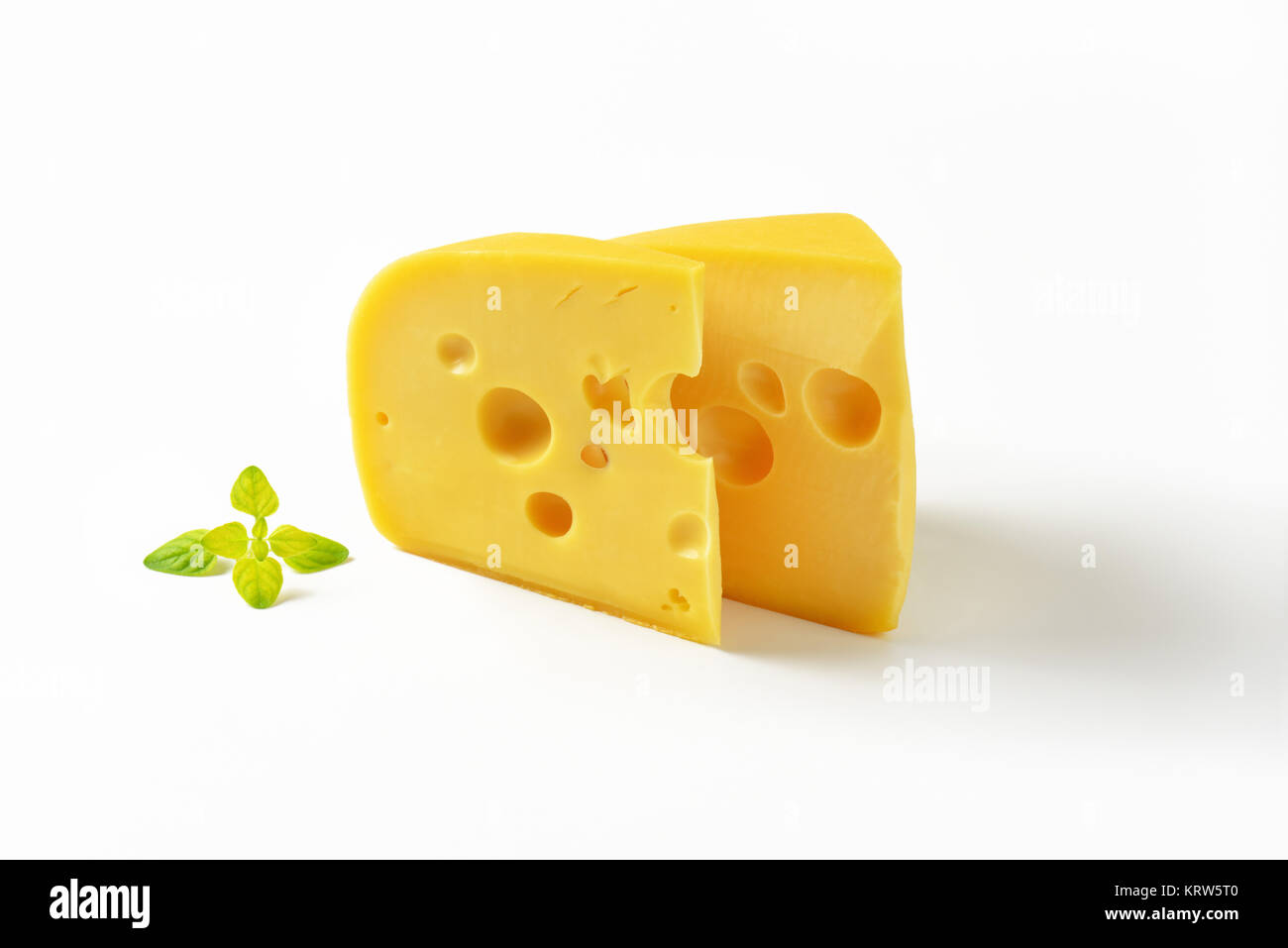 wedges of yellow cheese with eyes Stock Photo - Alamy