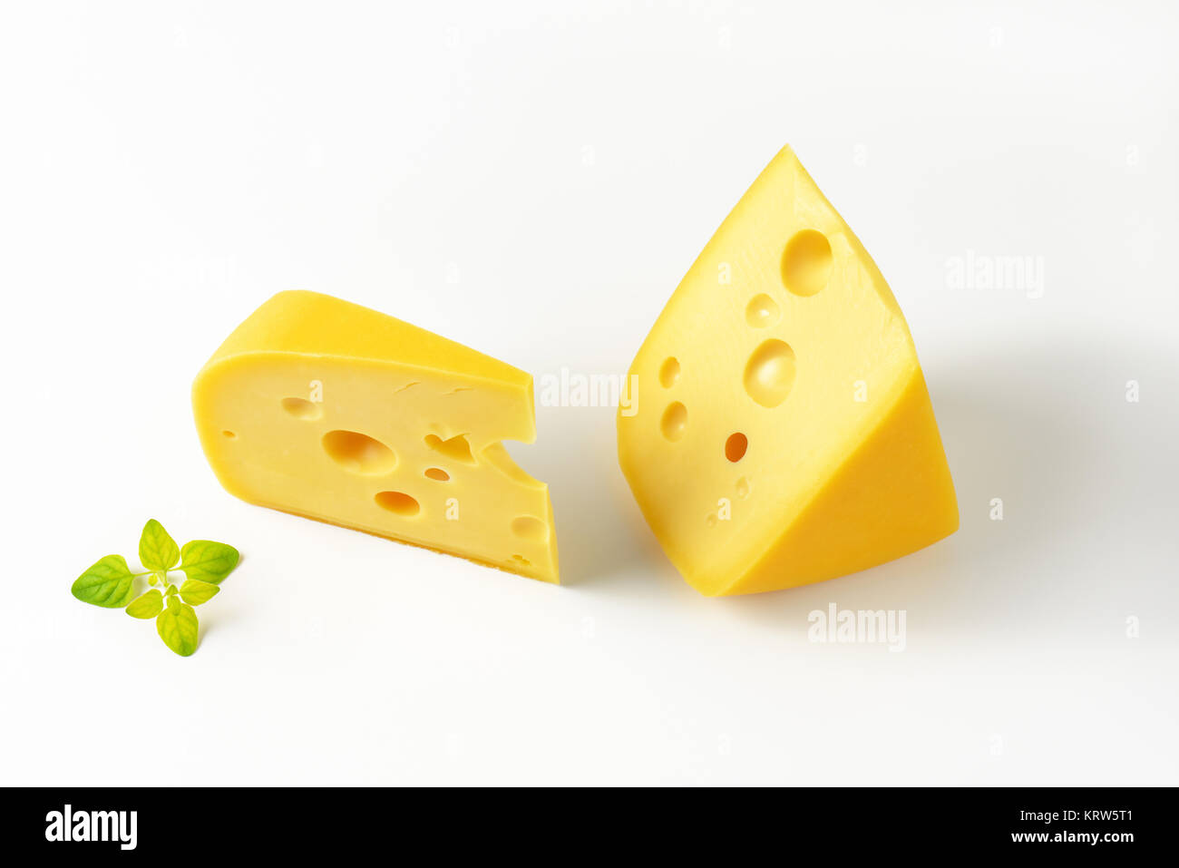 wedges of yellow cheese with eyes Stock Photo - Alamy