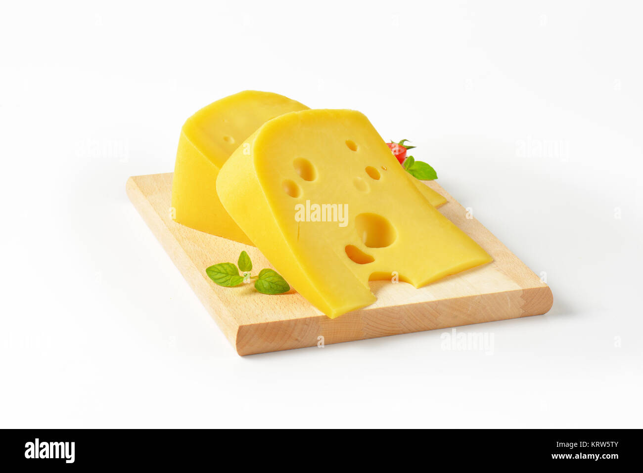 wedges of yellow cheese with eyes Stock Photo - Alamy