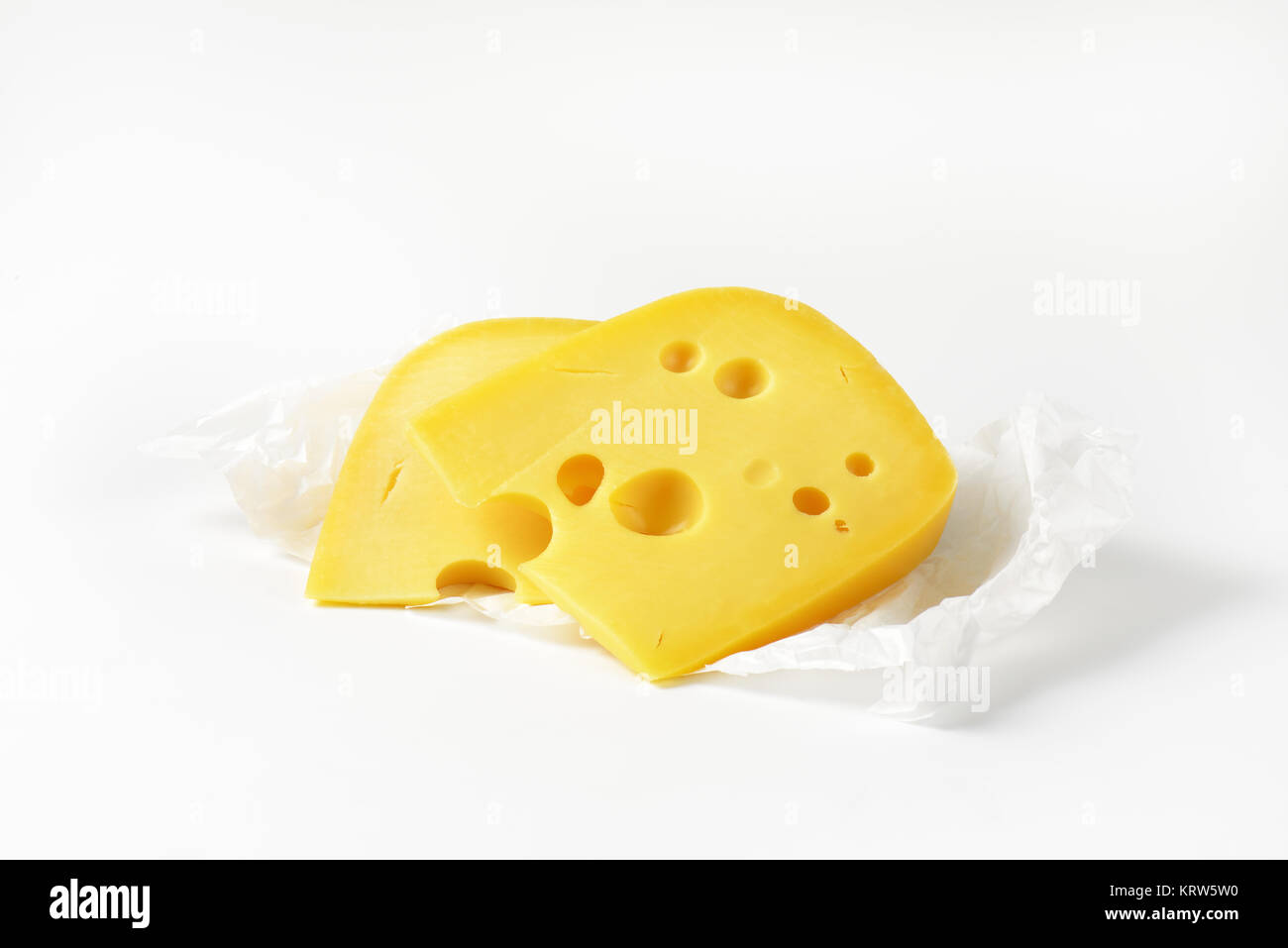 wedges of yellow cheese with eyes Stock Photo - Alamy