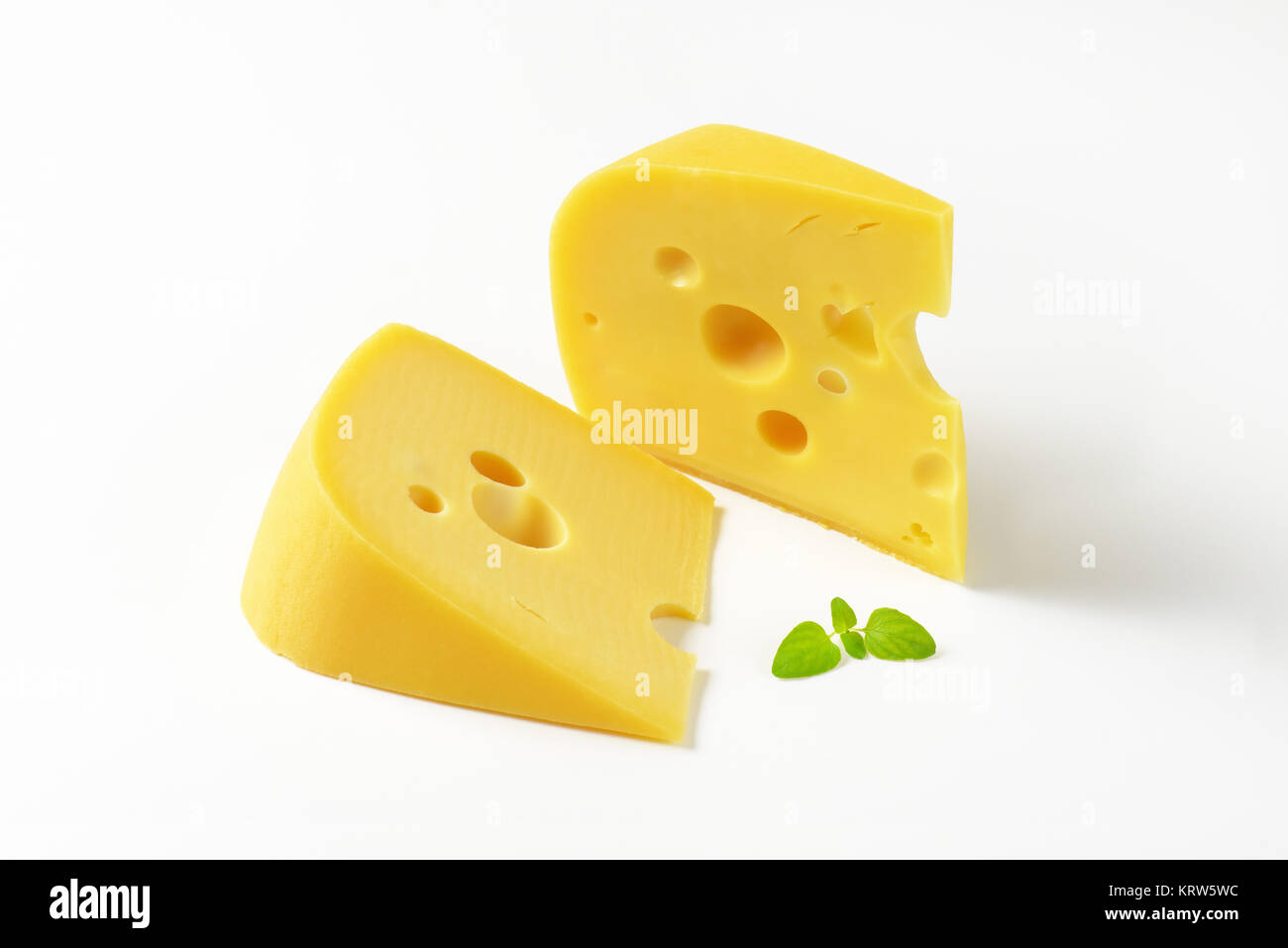 wedges of yellow cheese with eyes Stock Photo - Alamy