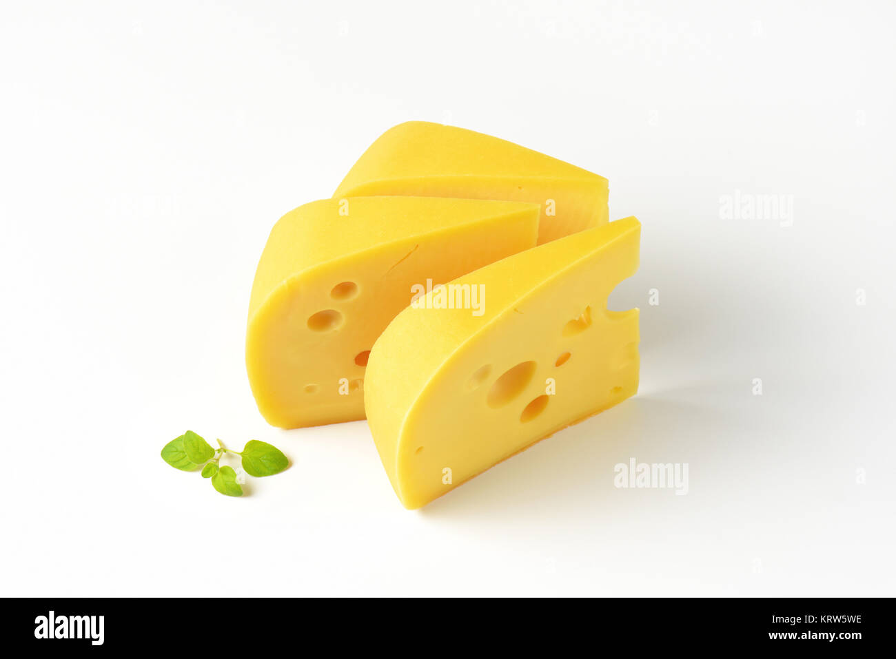 wedges of Swiss cheese Stock Photo - Alamy