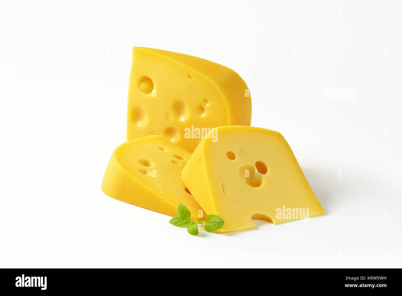 Swiss cheese wedges hi-res stock photography and images - Alamy