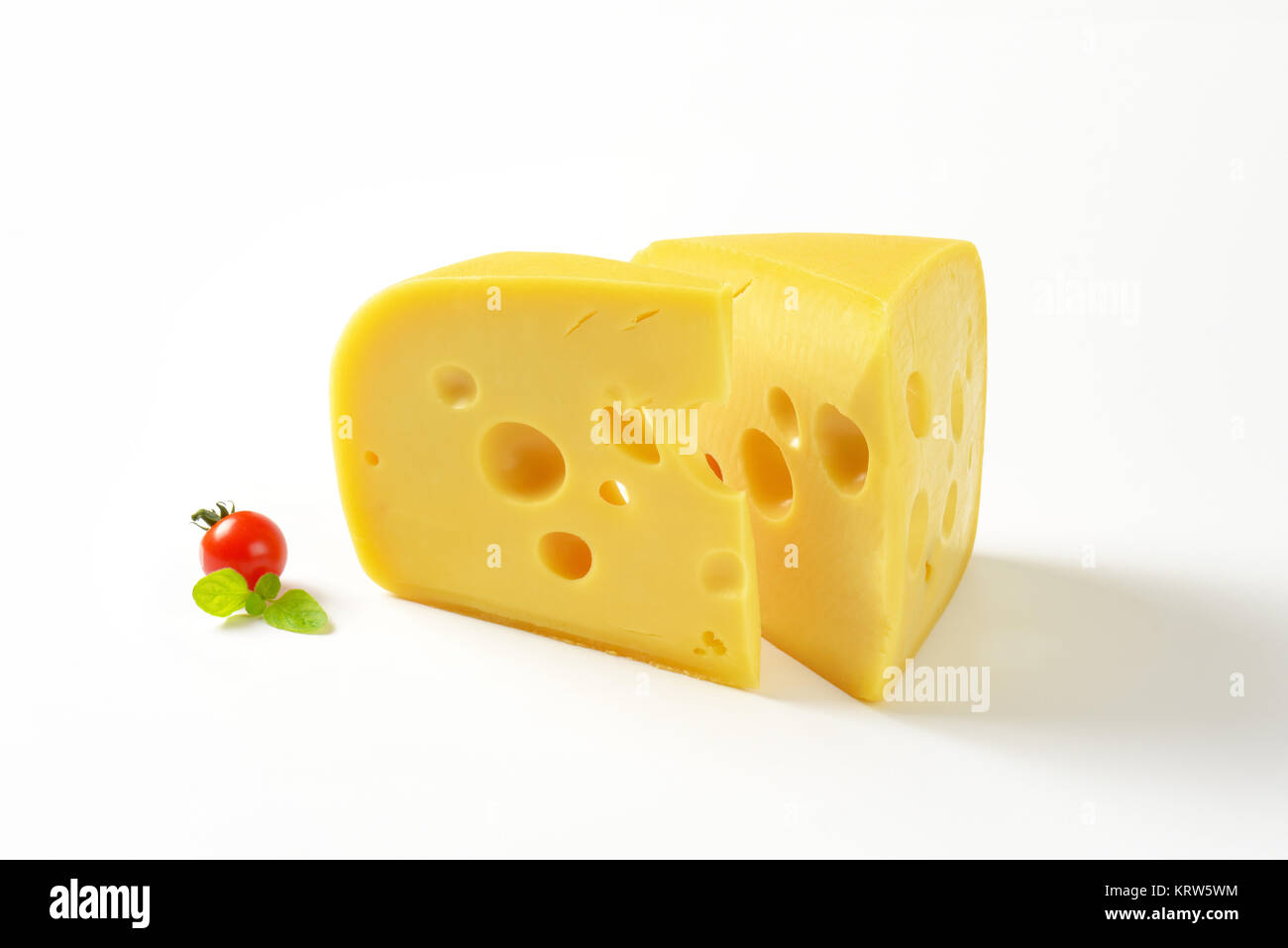 wedges of yellow cheese with eyes Stock Photo - Alamy