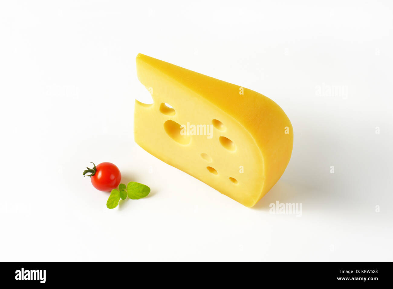 wedge of yellow cheese with eyes Stock Photo - Alamy