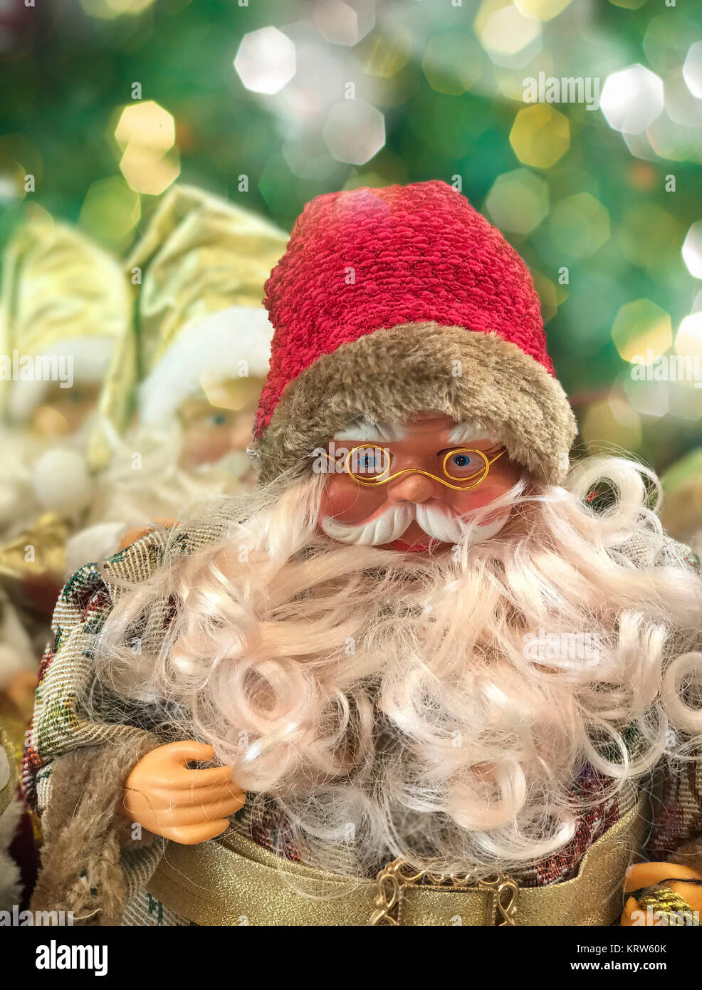 Smiling Santa Claus on a blurred background with bokeh Stock Photo - Alamy