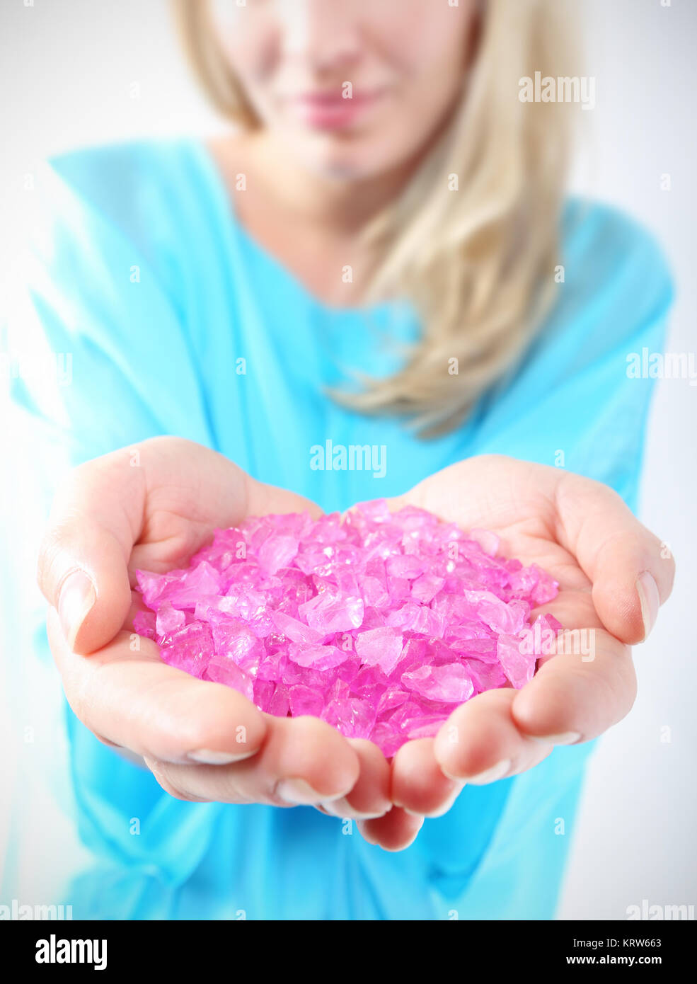 woman's hands holding colorful crystals pastel crystals Stock Photo - Alamy