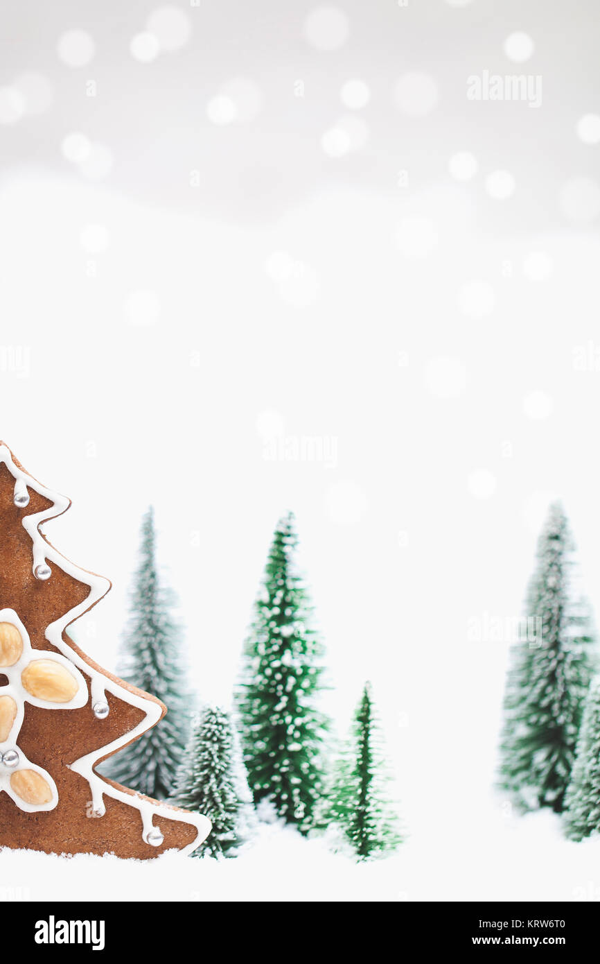 Snowy Winter Forest with gingerbread christmas tree Stock Photo - Alamy