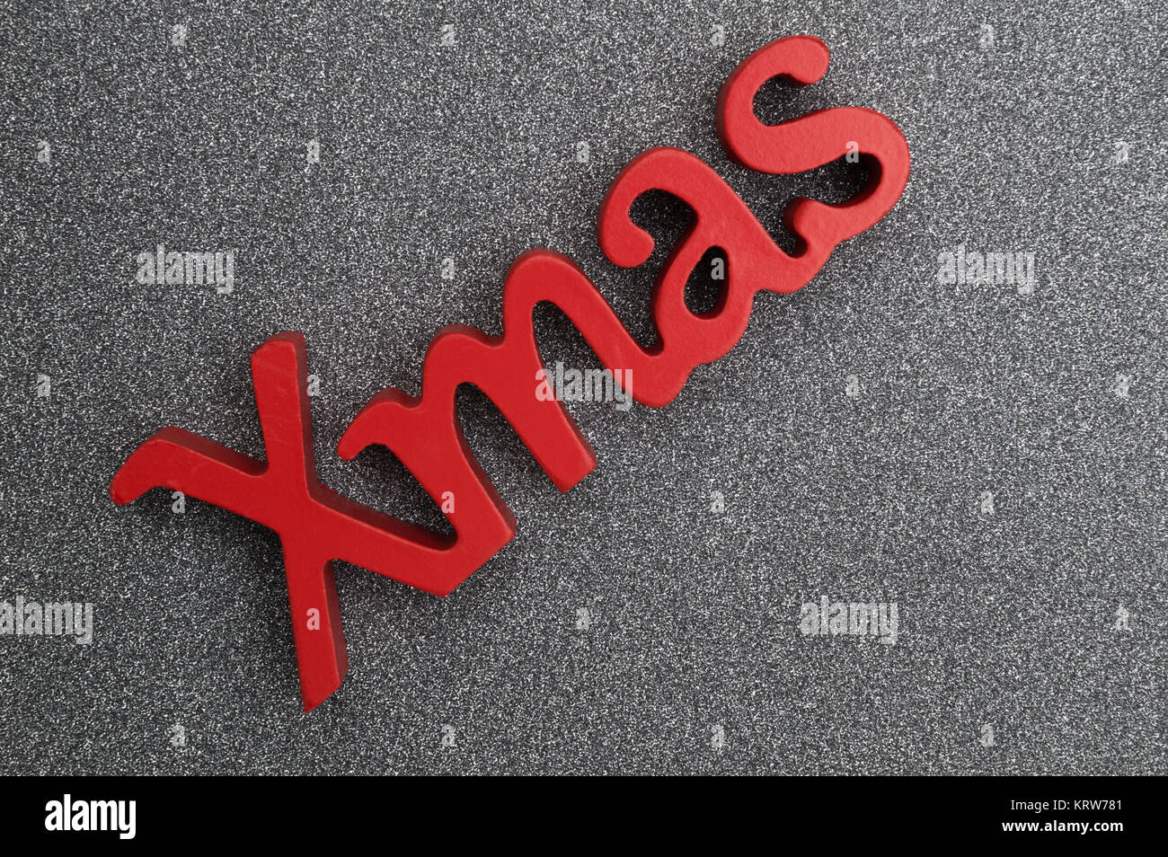 X-mas text on black background Stock Photo - Alamy