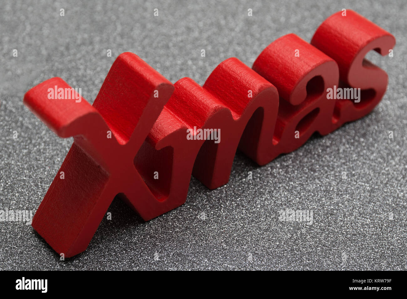 X-mas text on black background Stock Photo - Alamy