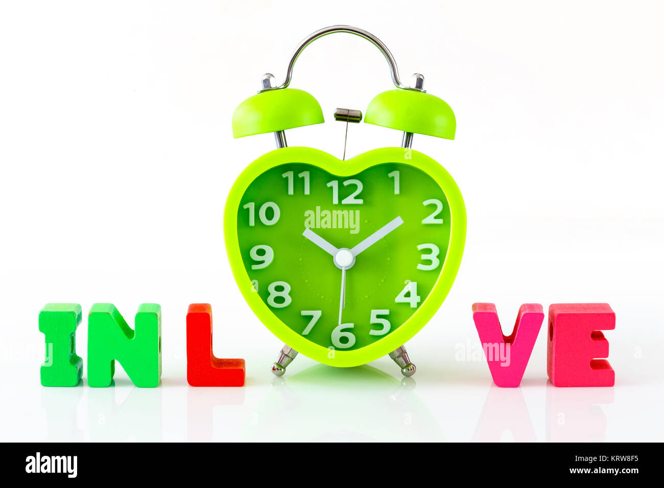 Heart Shaped Clock Wooden Alphabets for Valentin's Concept Stock Photo ...