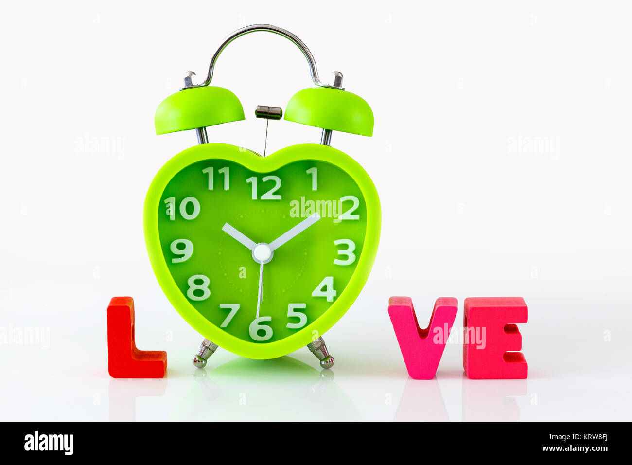 Heart Shaped Clock Wooden Alphabets for Valentin's Concept Stock Photo ...