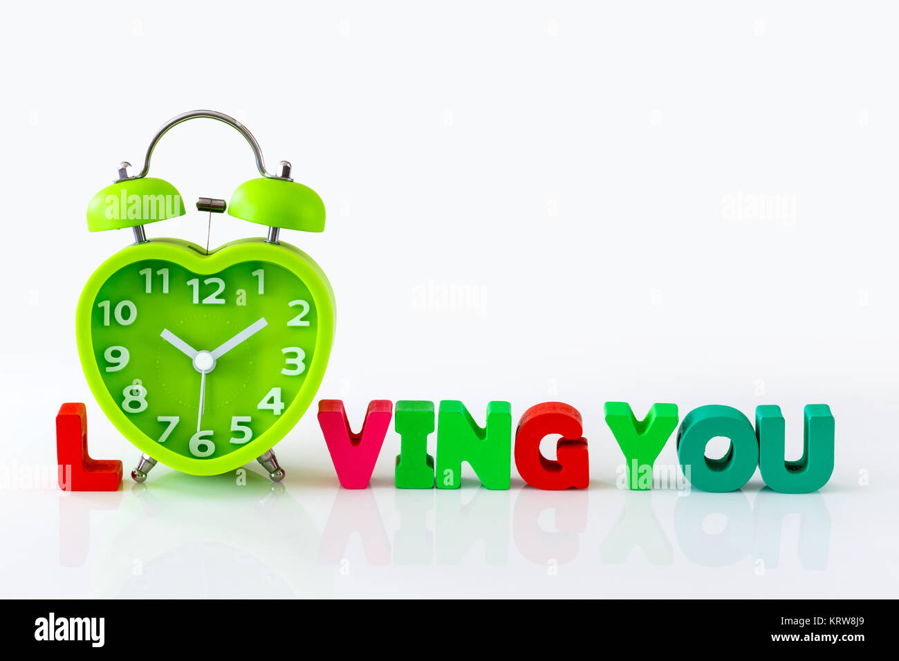 Heart Shaped Clock Wooden Alphabets for Valentin's Concept Stock Photo ...
