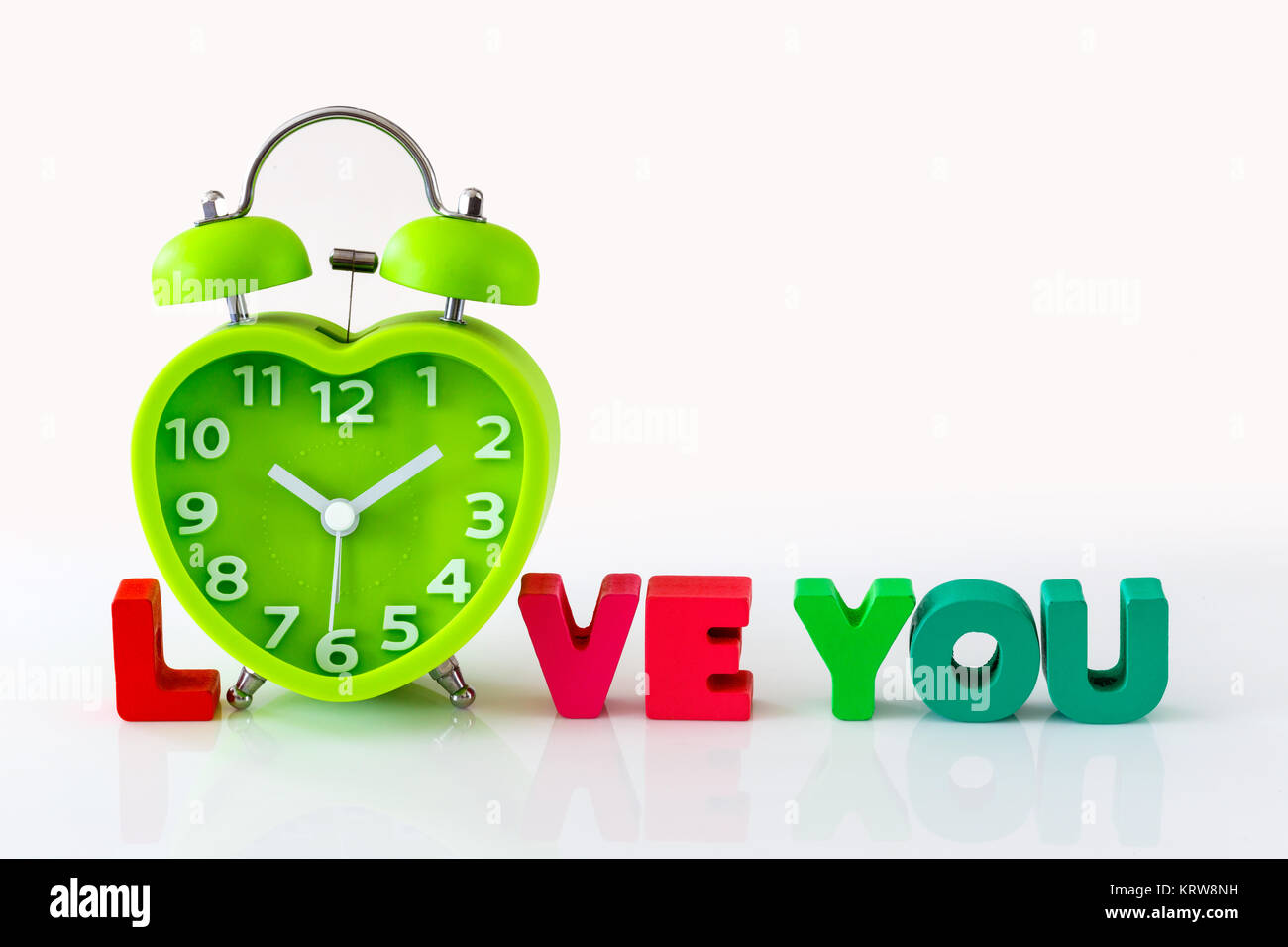 Heart Shaped Clock Wooden Alphabets for Valentin's Concept Stock Photo ...