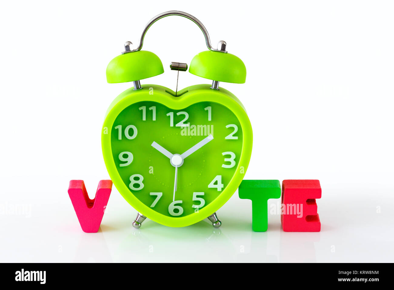 Conceptual Colorful Wooden Alphabets With Table Clock Stock Photo - Alamy