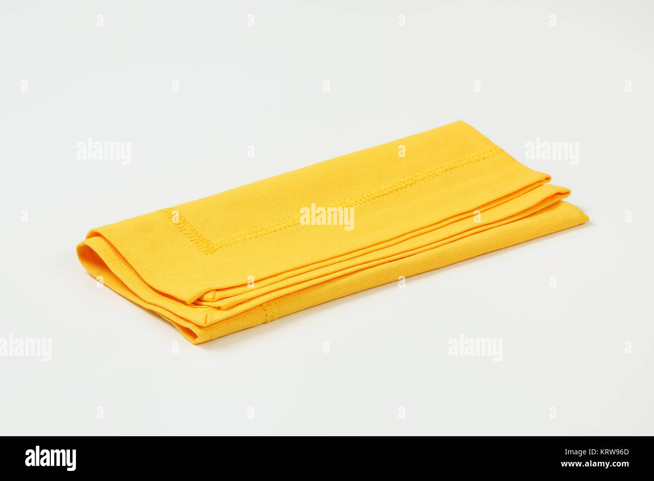 yellow cloth place mat Stock Photo - Alamy