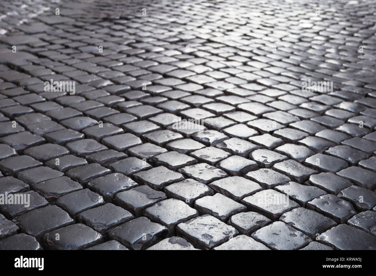 cobble stone pavement in Rome city Stock Photo - Alamy