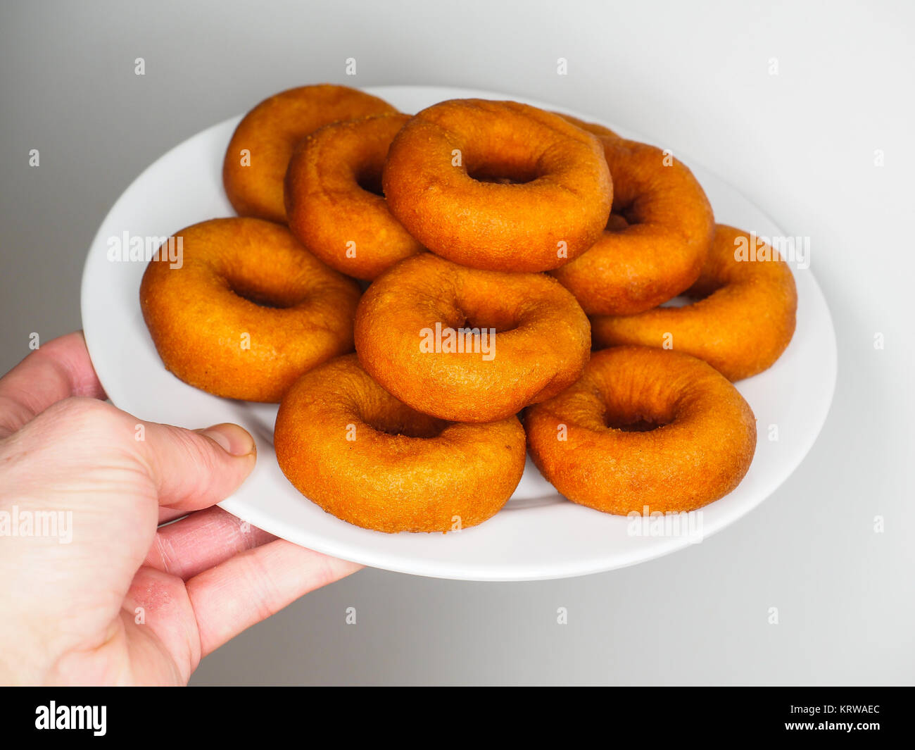 Donuts doughnuts food man hi-res stock photography and images - Alamy