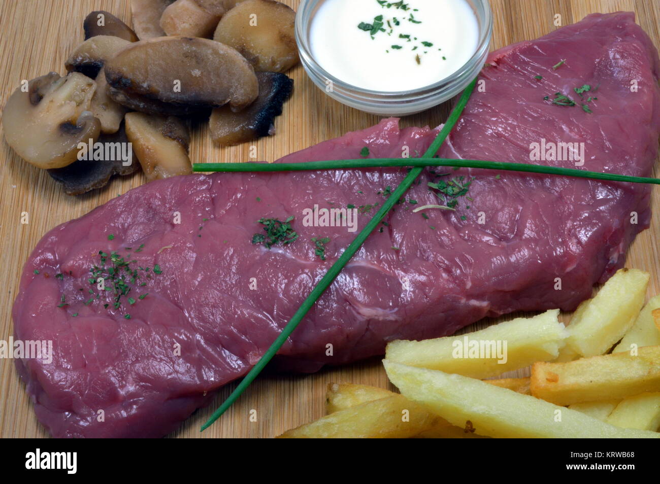 Steak of very red ox with its cream Stock Photo - Alamy