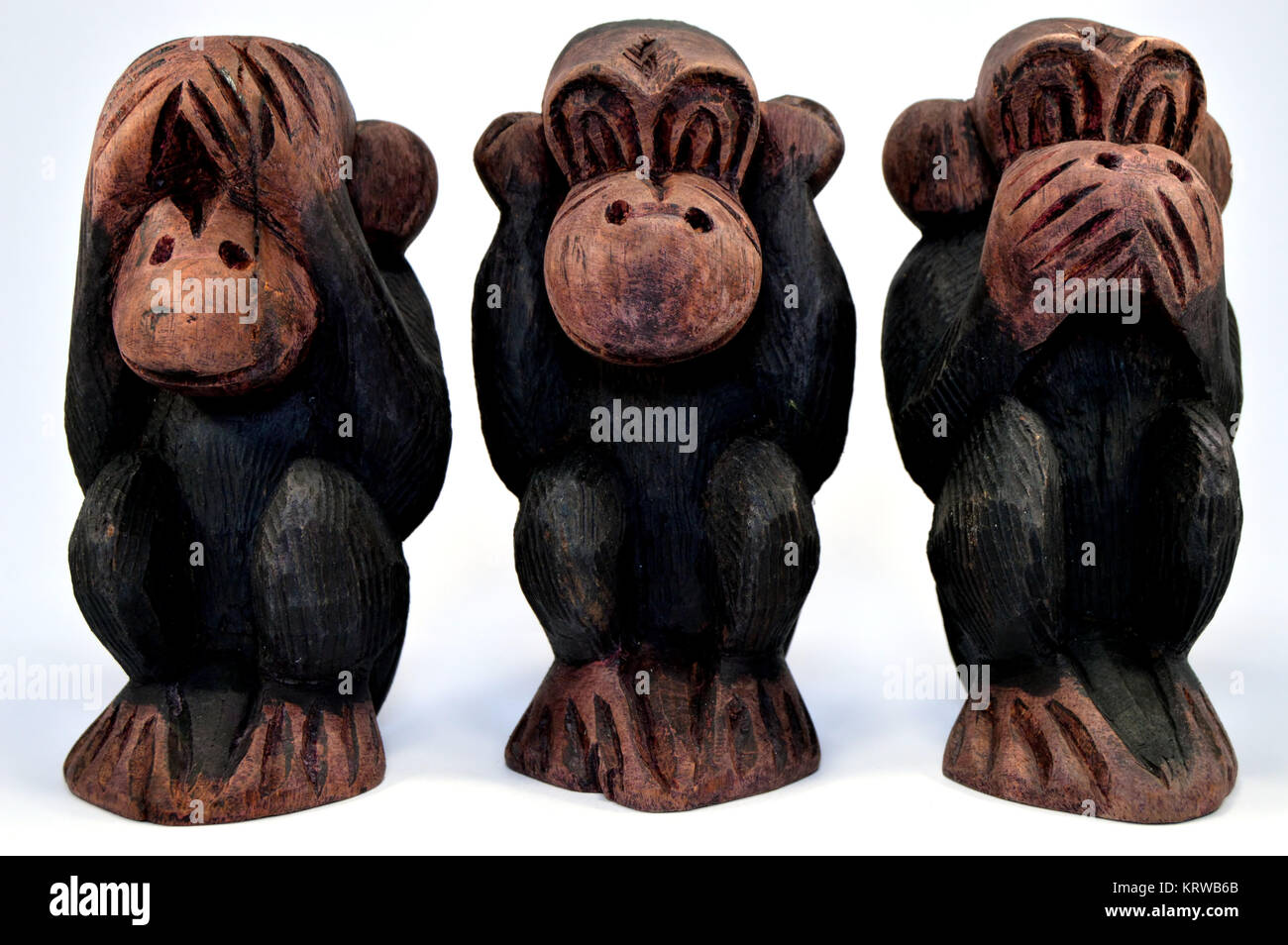 Three wooden monkeys Stock Photo - Alamy