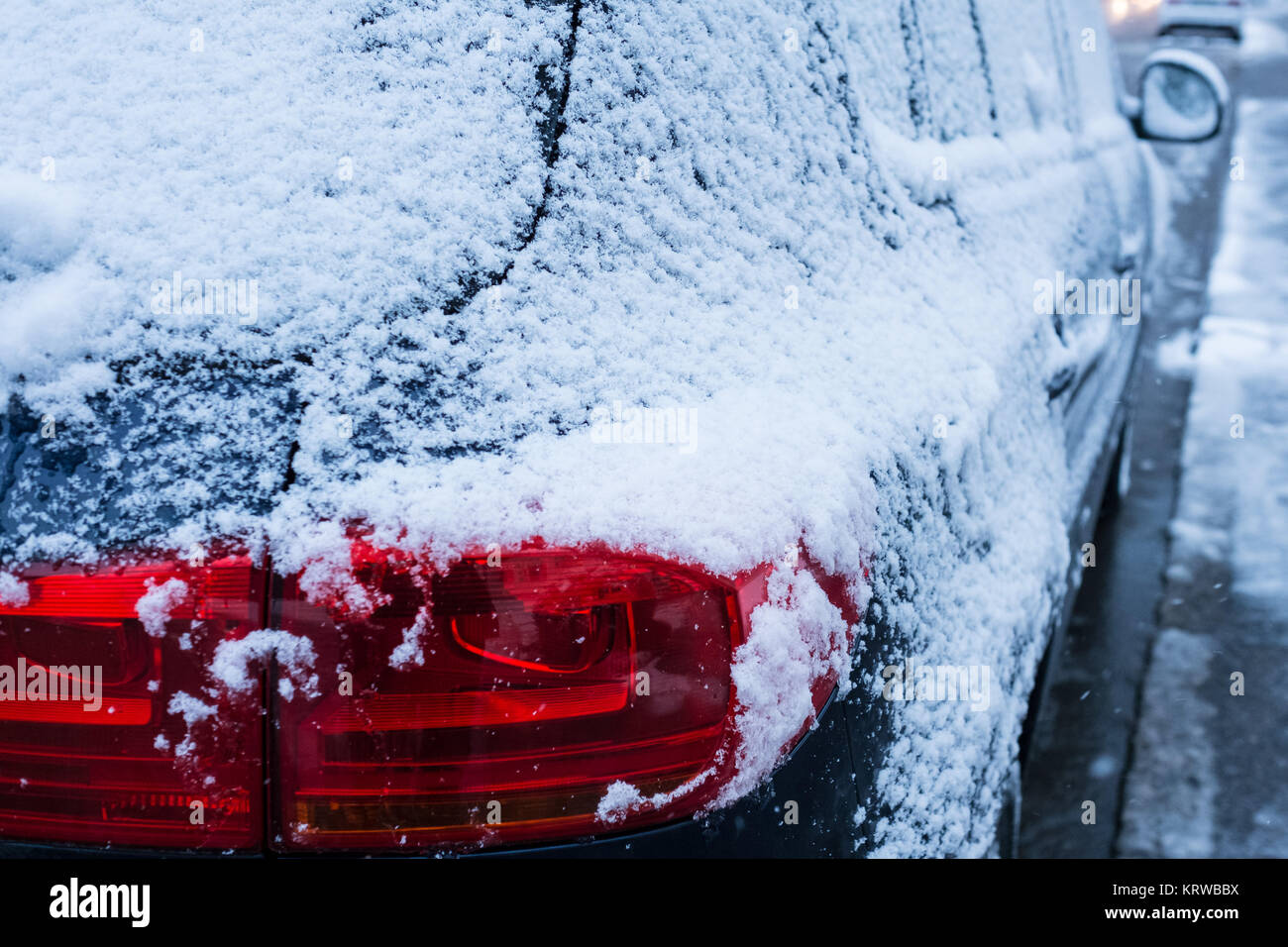 red tail light on the car with snow Stock Photo - Alamy
