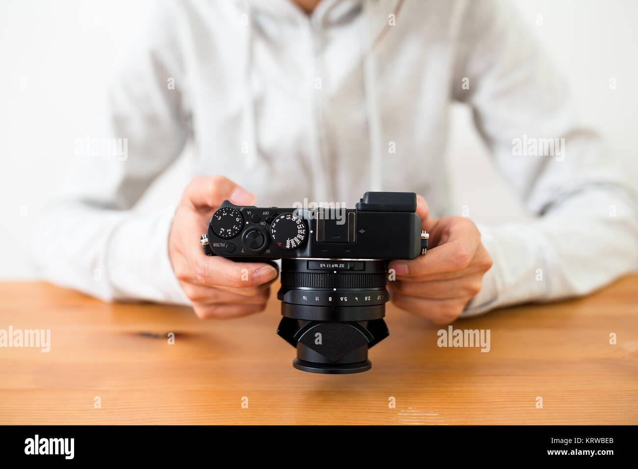 Woman checking on digital camera Stock Photo - Alamy
